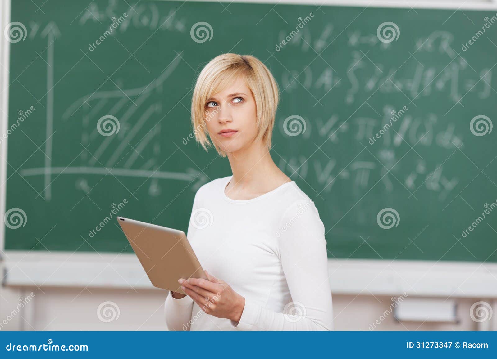 Thoughtful Student Holding Tablet-pc Stock Image - Image of blond ...