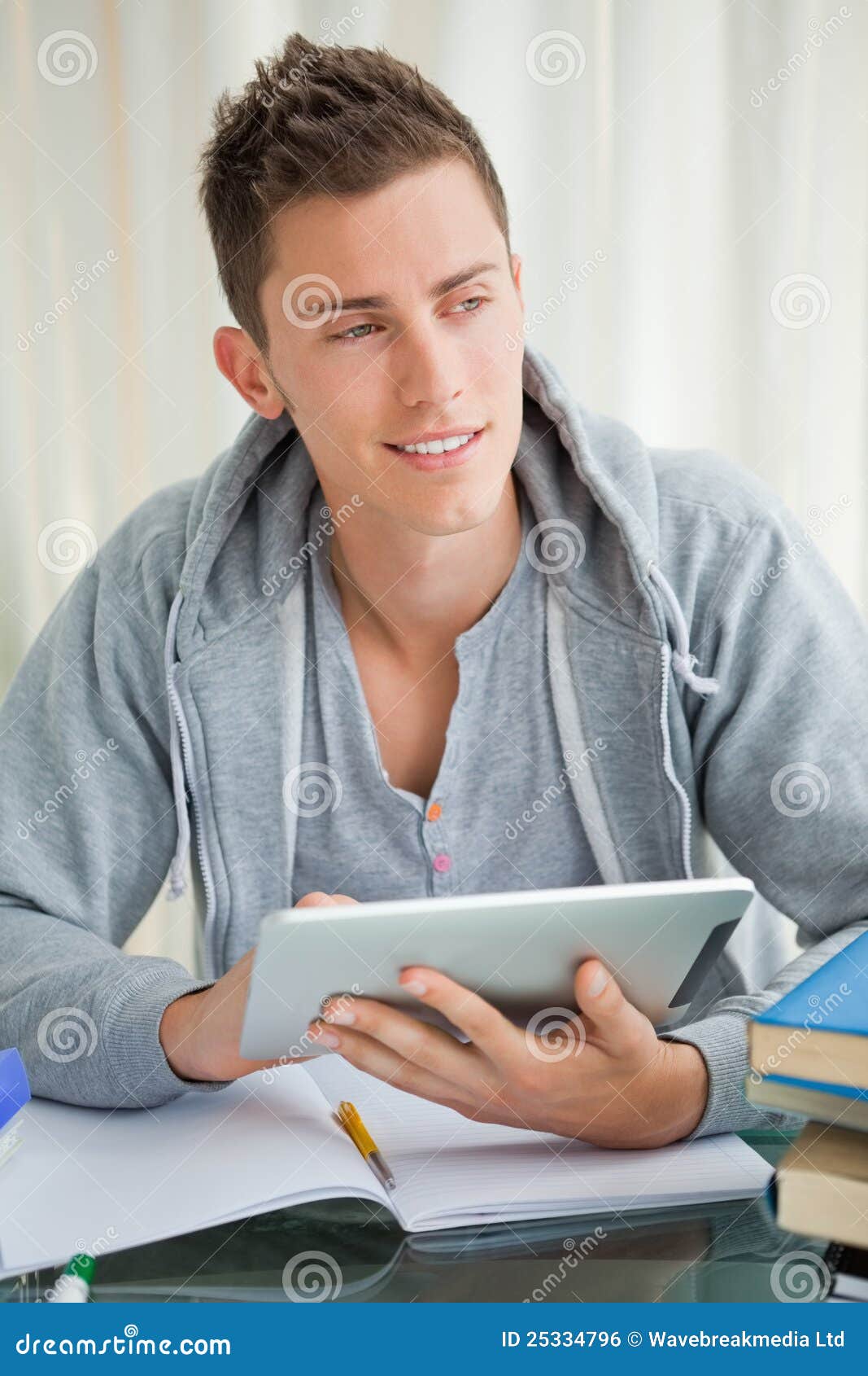 Thoughtful Student Using a Touch Pad Stock Photo - Image of brunette ...
