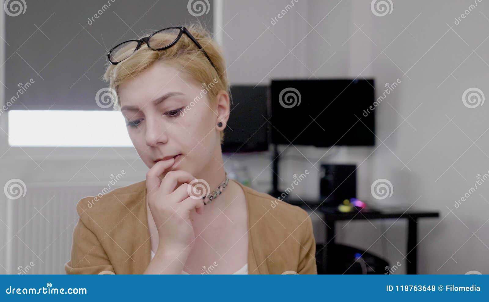 Thoughtful Thinking Young Employee Working on the Office in a Difficult ...