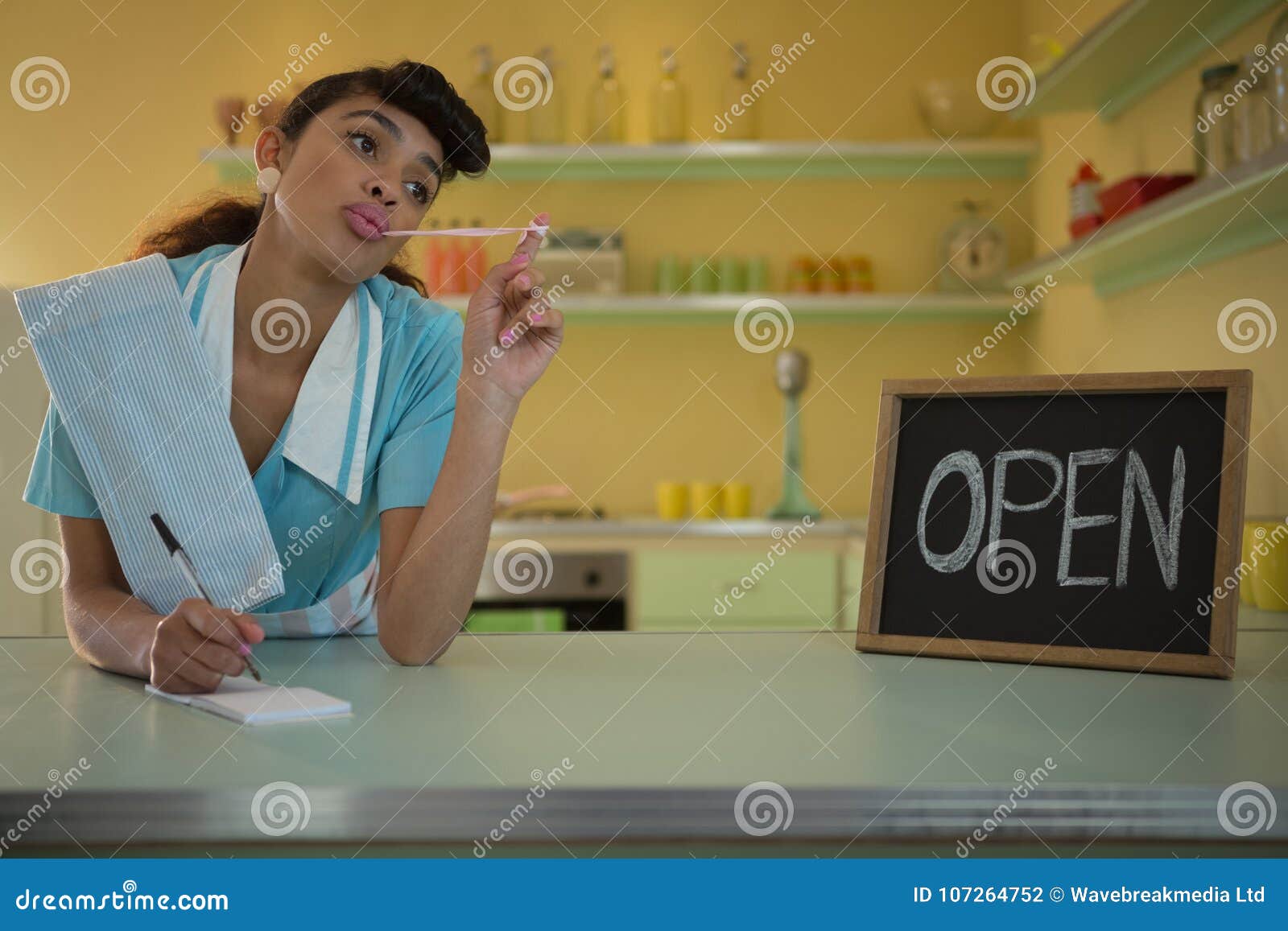 Waitress Standing at Counter in Restaurant Stock Photo - Image of ...