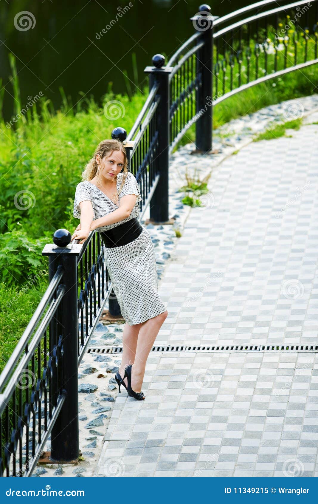 Thoughtful Woman on the Bridge. Stock Image - Image of outdoor, bridge ...
