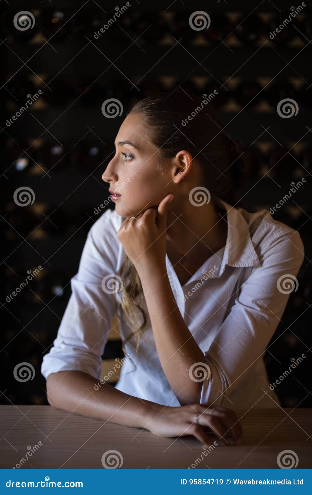 Thoughtful Woman Sitting at Counter Stock Image - Image of counter ...