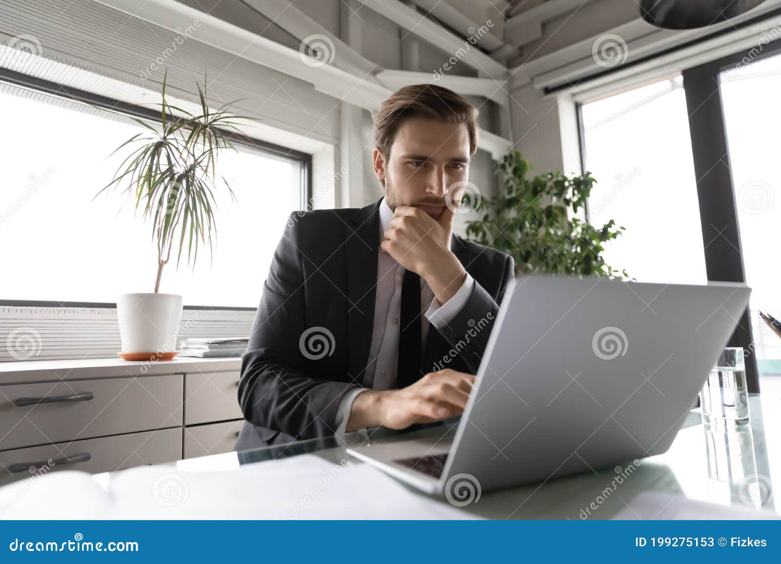 Thoughtful Young Executive Manager Finding Problem Solution. Stock ...