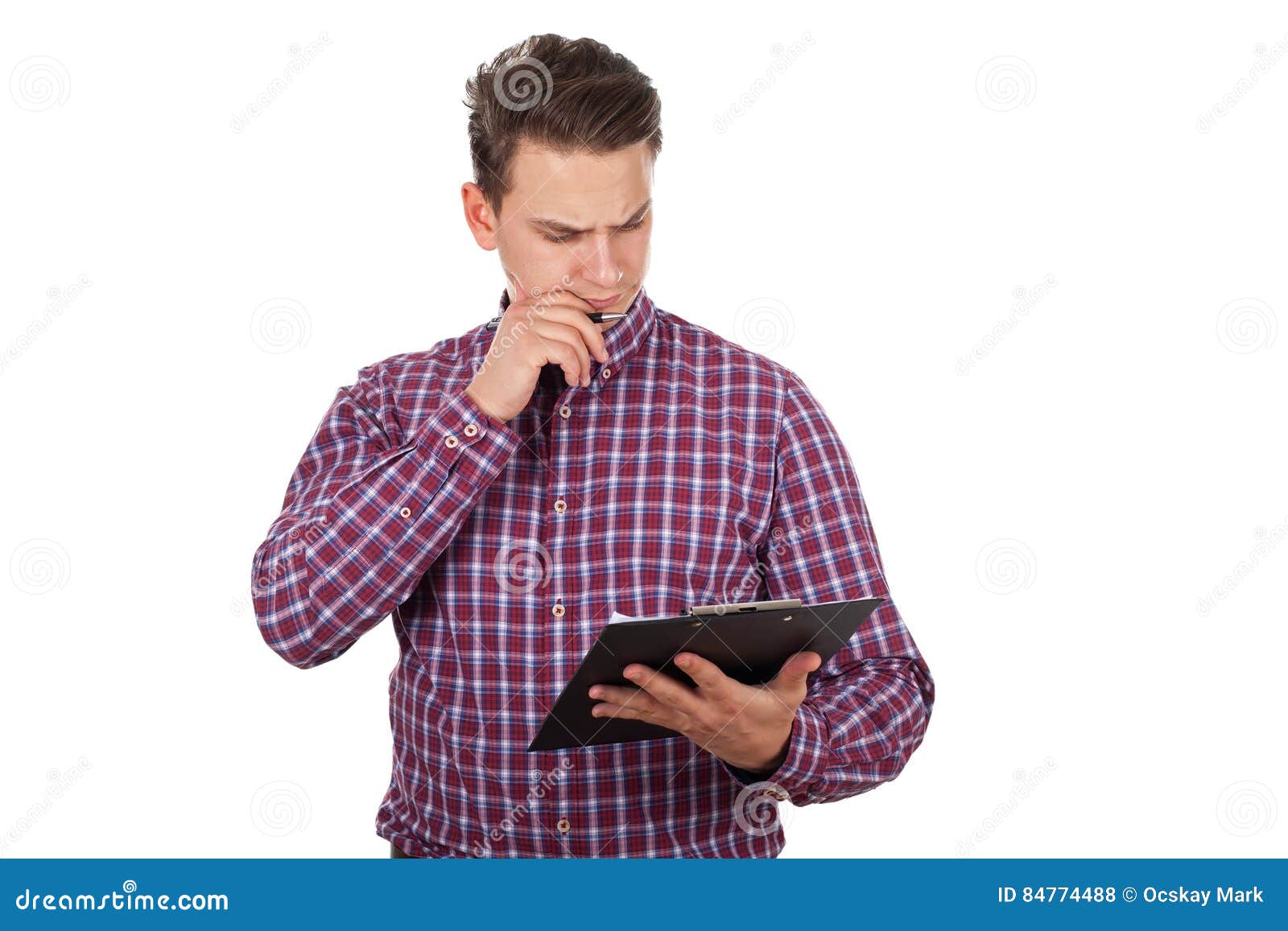 Thoughtful Young Man Doing Paperwork Stock Photo - Image of graduated ...
