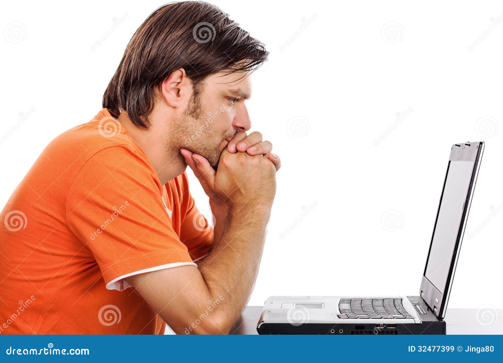 Thoughtful Young Man Looking at His Laptop Stock Image - Image of ...