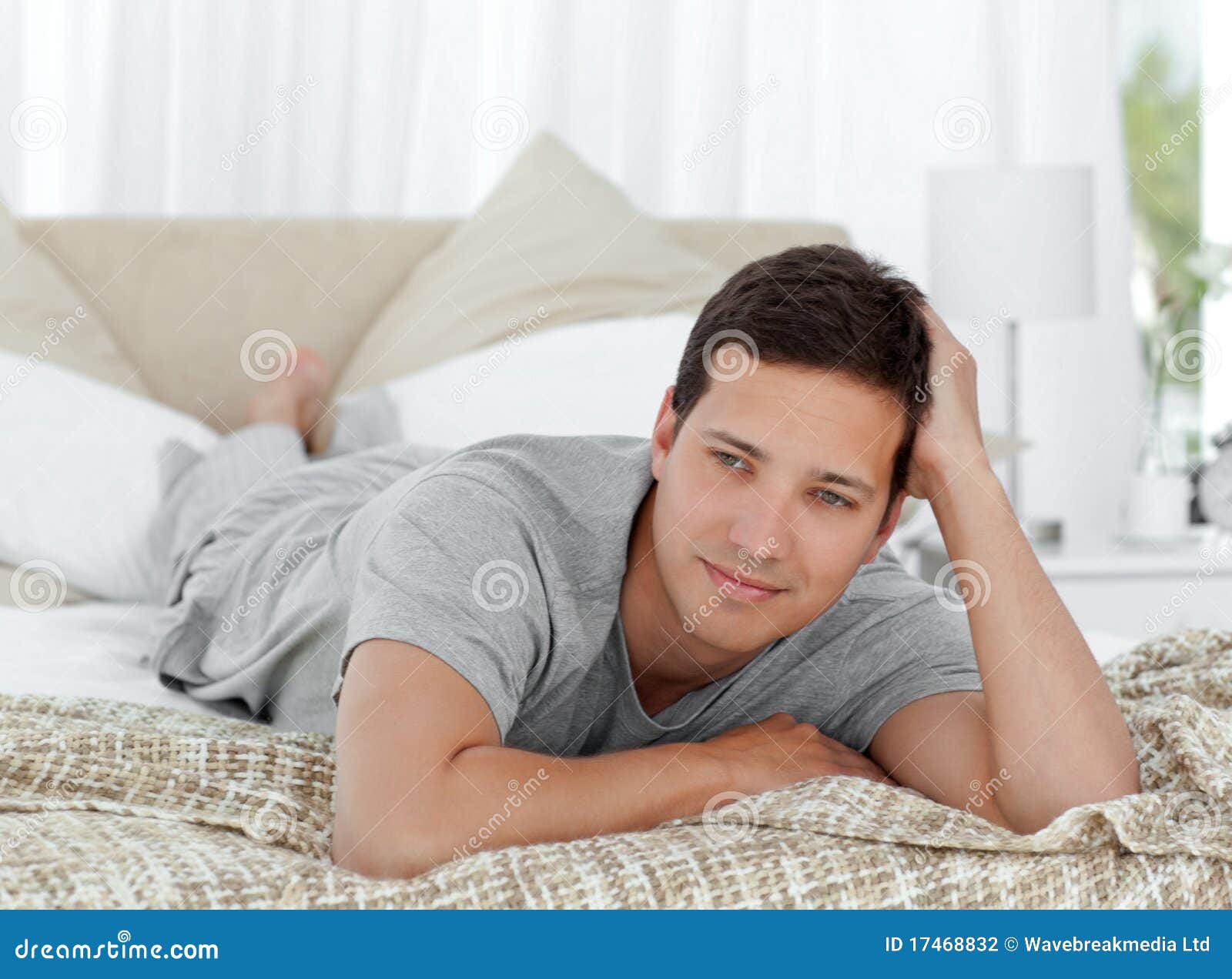 Thoughtful Young Man Lying On His Bed Stock Photography - Image: 17468832