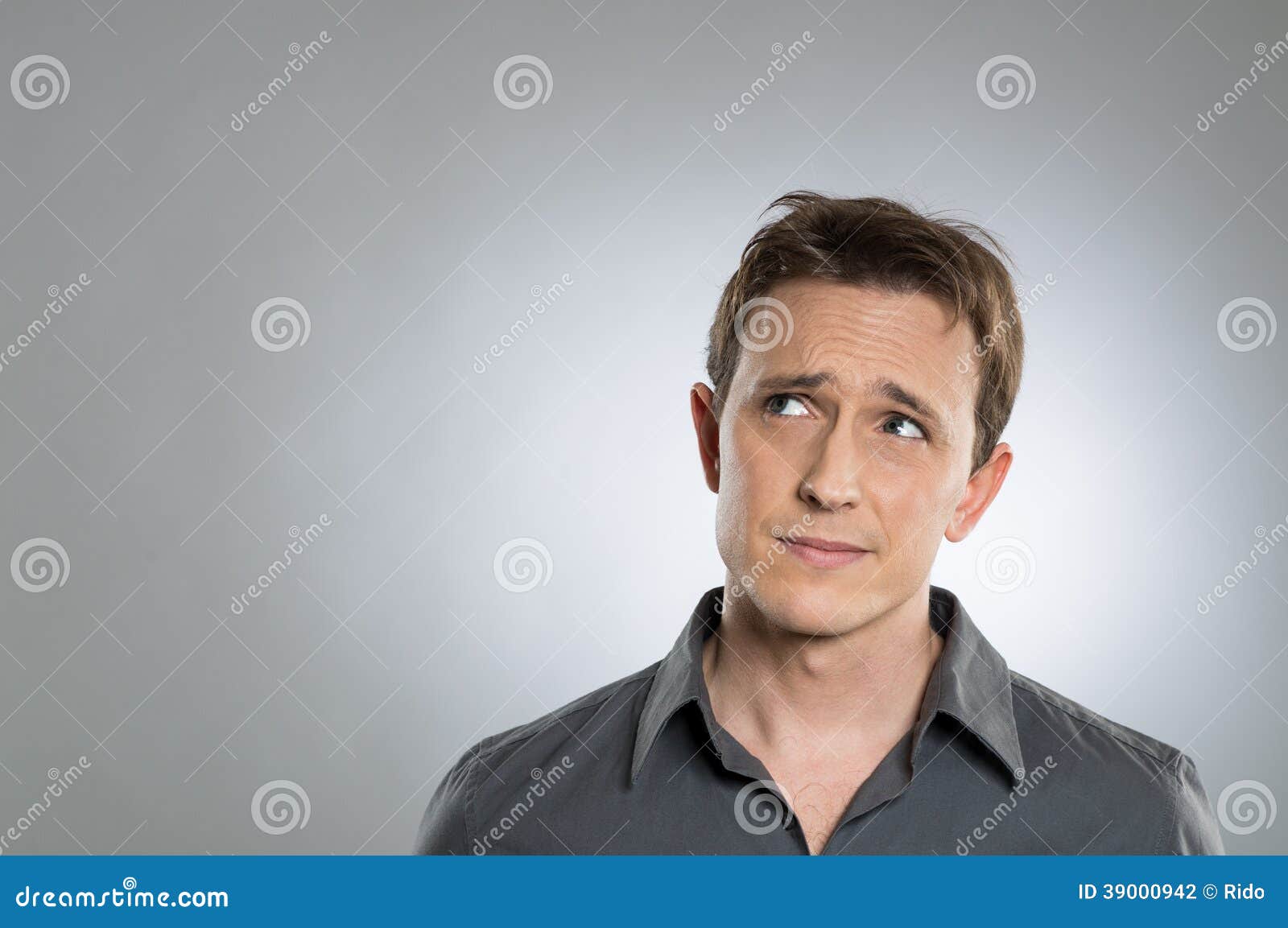 Thoughtful Young Man stock photo. Image of decision, handsome - 39000942