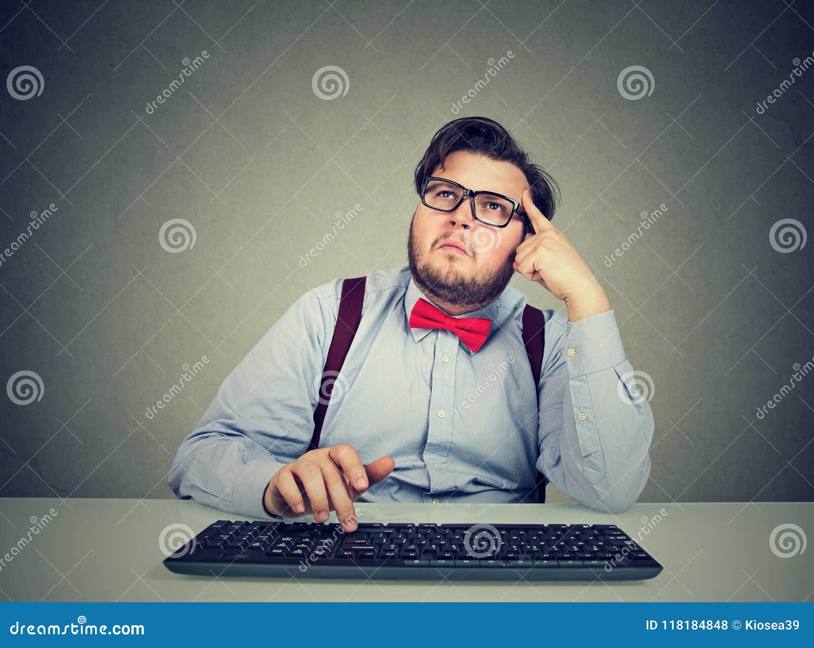 Thoughtful Young Man Remembering Password Stock Photo - Image of male ...