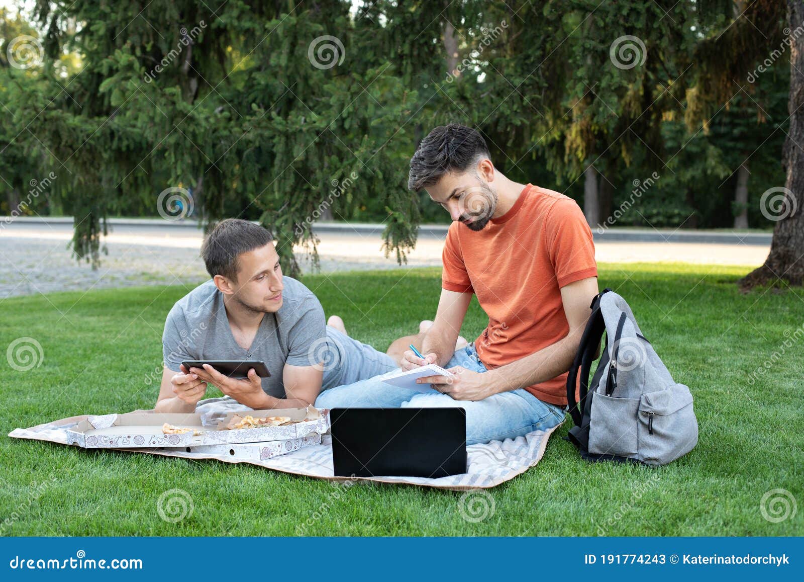 Man Explaining Something To Friend In Laptop. Happy Students Studying ...
