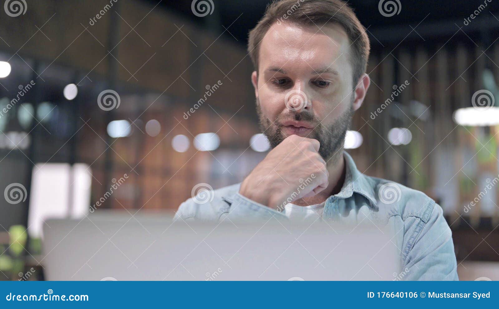 Thoughtful Young Man Thinking at Work Stock Photo - Image of ...