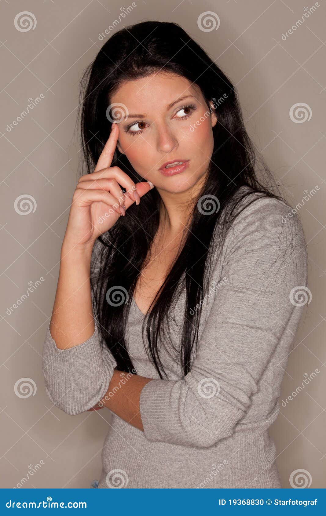 Thoughtful young woman stock photo. Image of smiling - 19368830