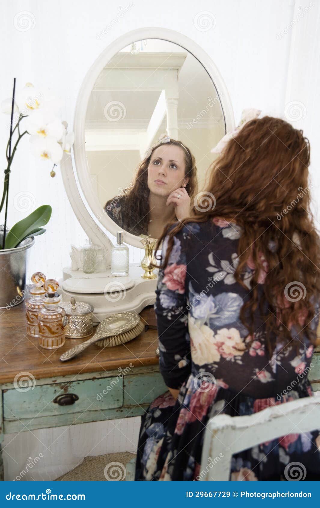 Thoughtful Young Woman Sitting in Front of Mirror Stock Image - Image ...