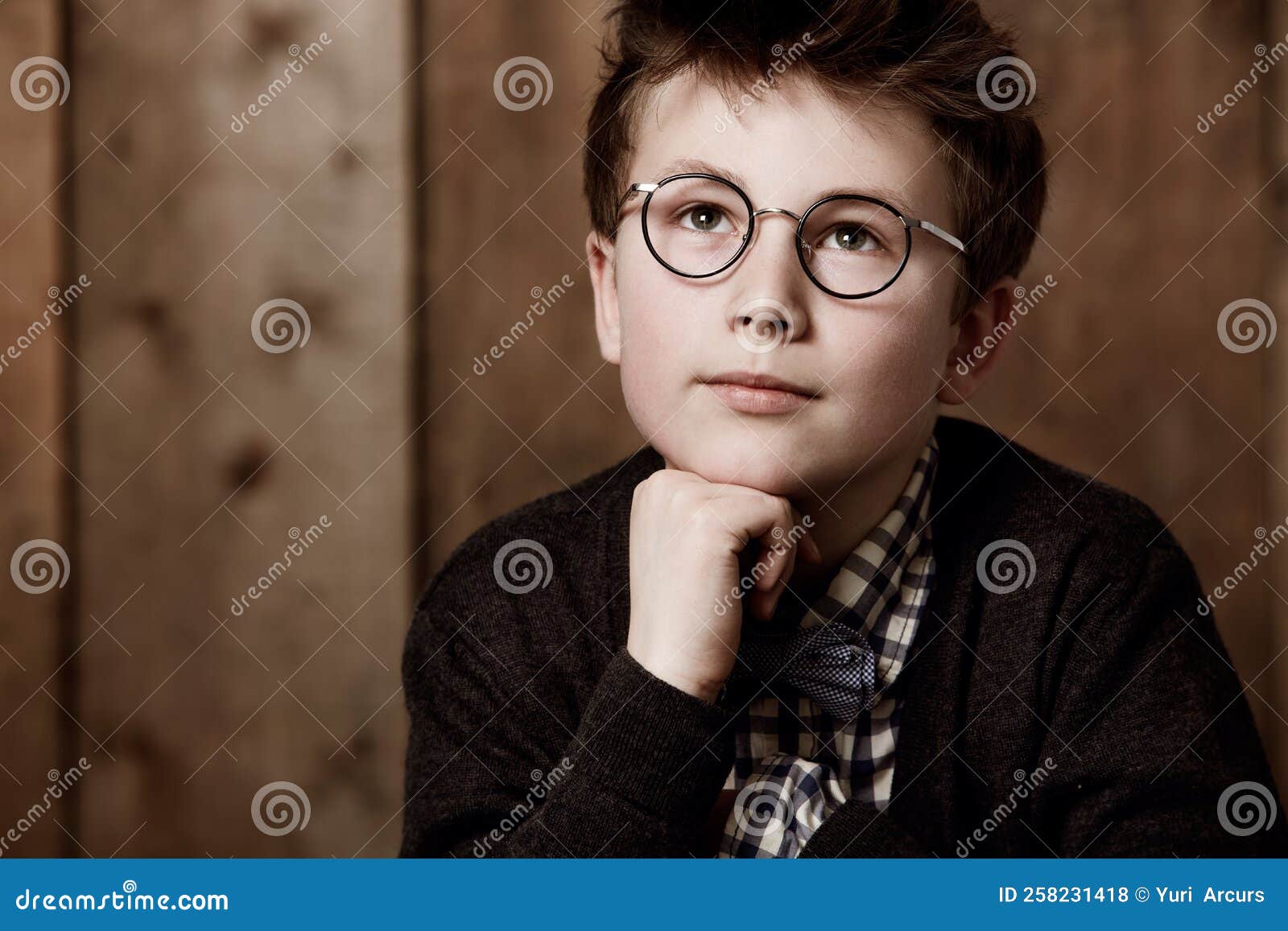 Thoughts of His Future. Young Boy Wearing Spectacles with a Thoughtful ...