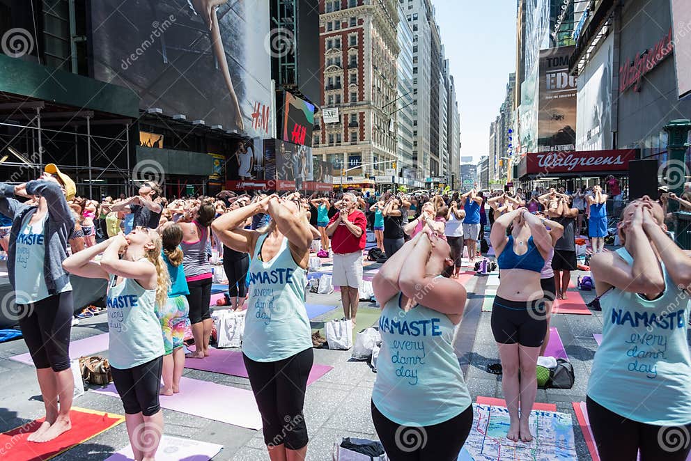 Thousands of New Yorkers Practicing Yoga in Times Square. Editorial ... Thousands of New Yorkers Practicing Yoga in Times Square. Editorial ...