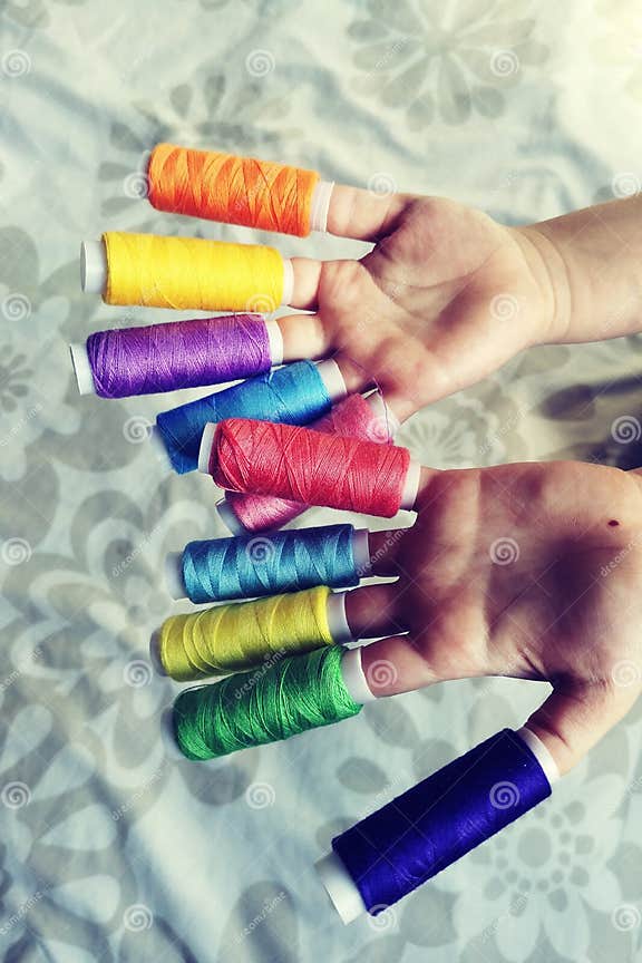 Thread. Hands Full of Colours Stock Image - Image of hand, thread ...