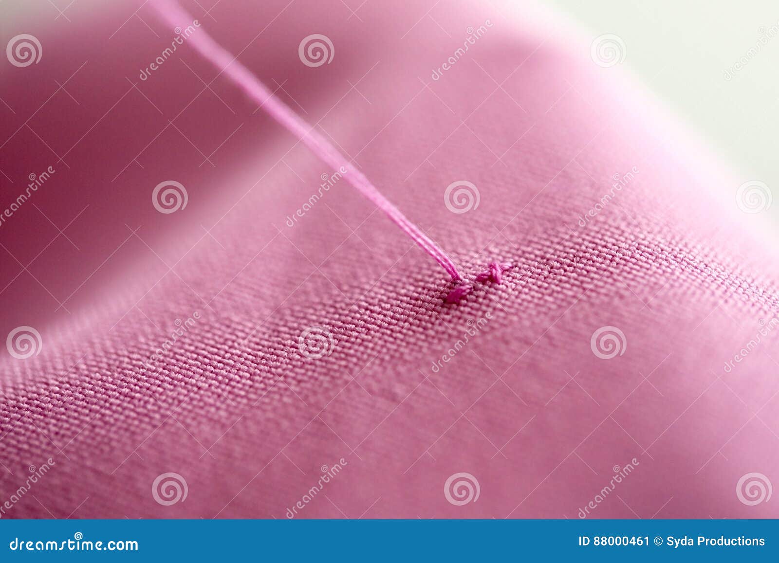Thread with Cross-stitch on Pink Fabric Stock Image - Image of sewing ...