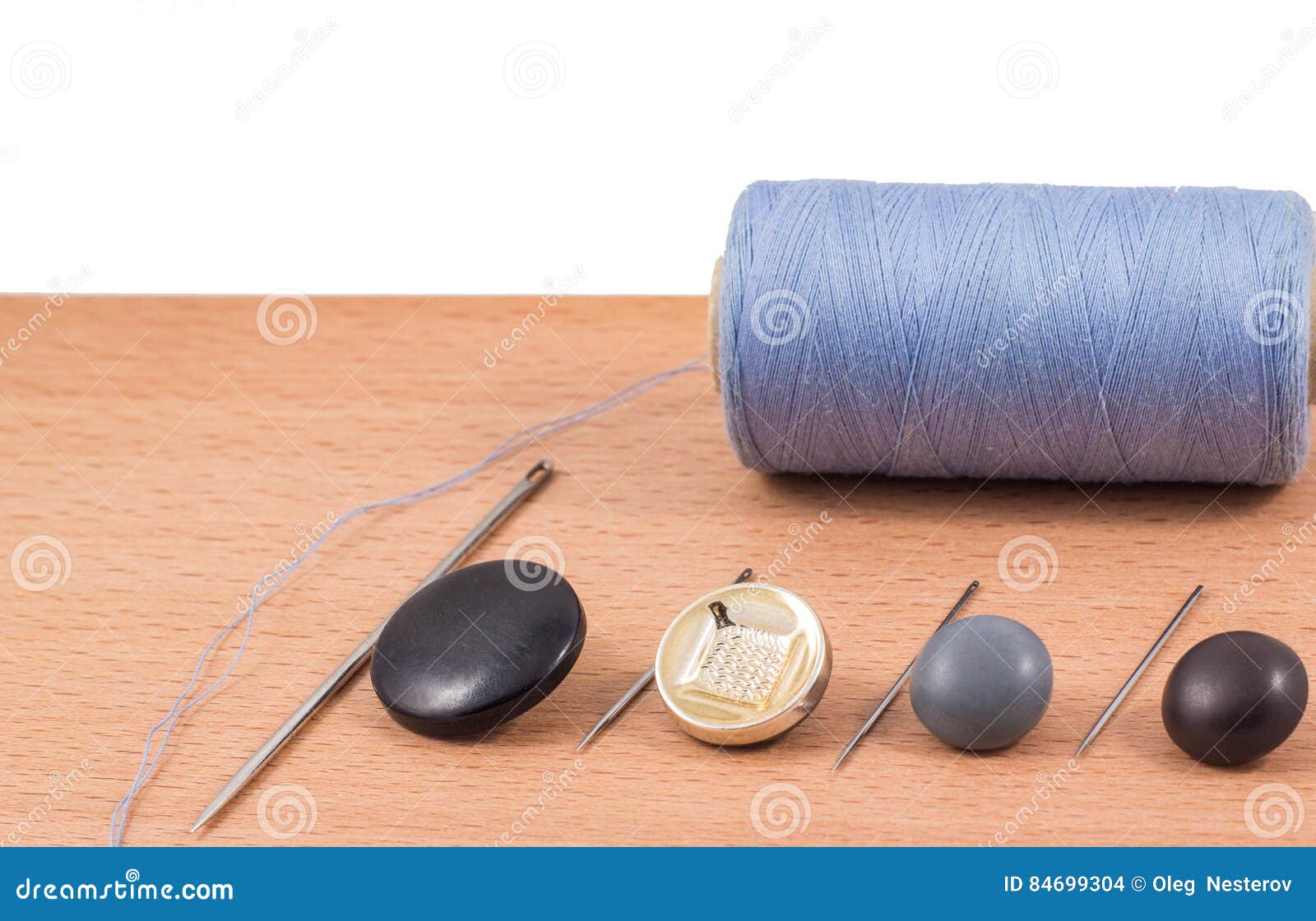 Thread a Needle and Buttons Stock Photo - Image of fine, coil: 84699304