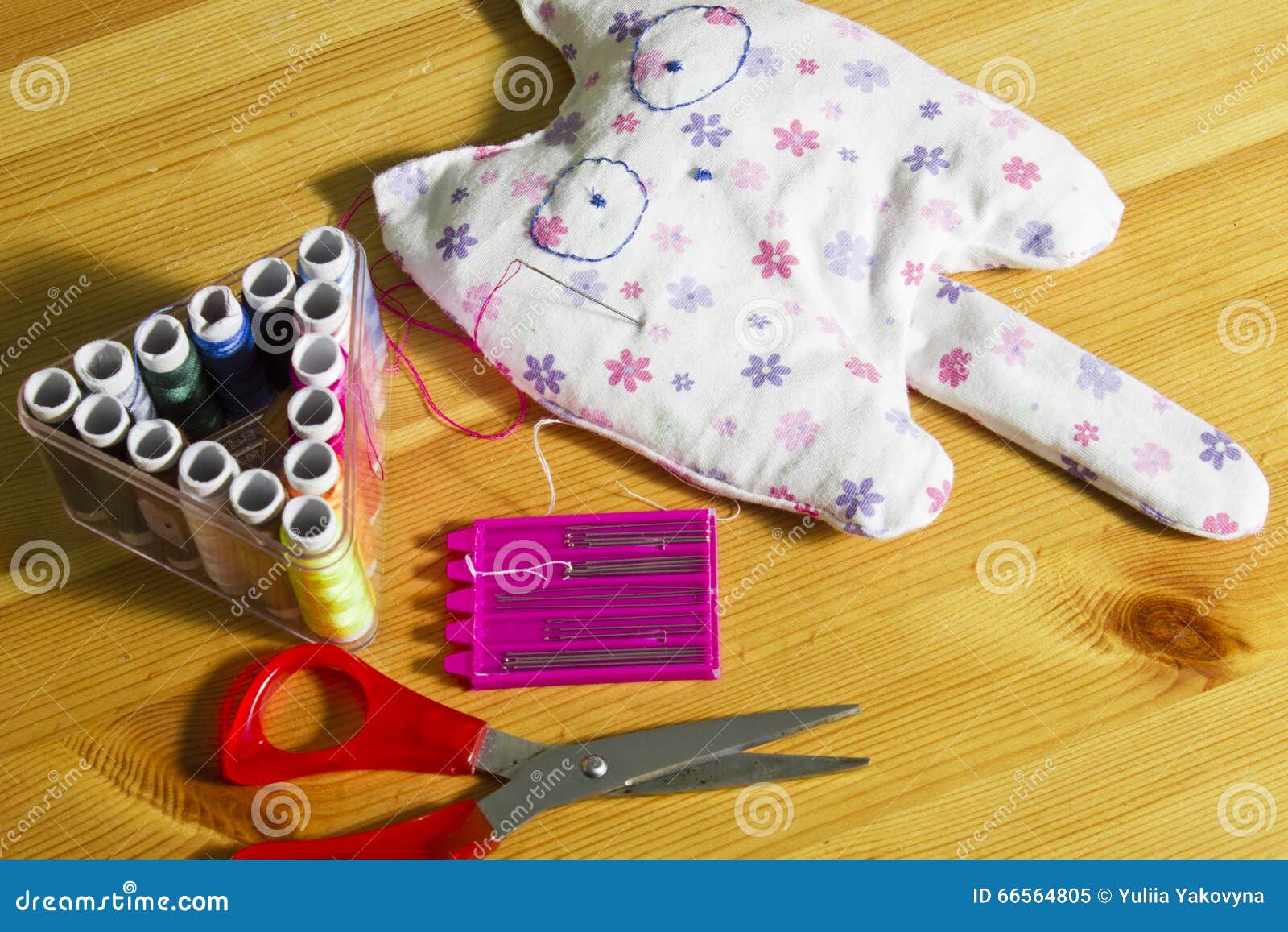 Thread, Needles, Scissors and a Toy on the Table. Stock Image - Image ...