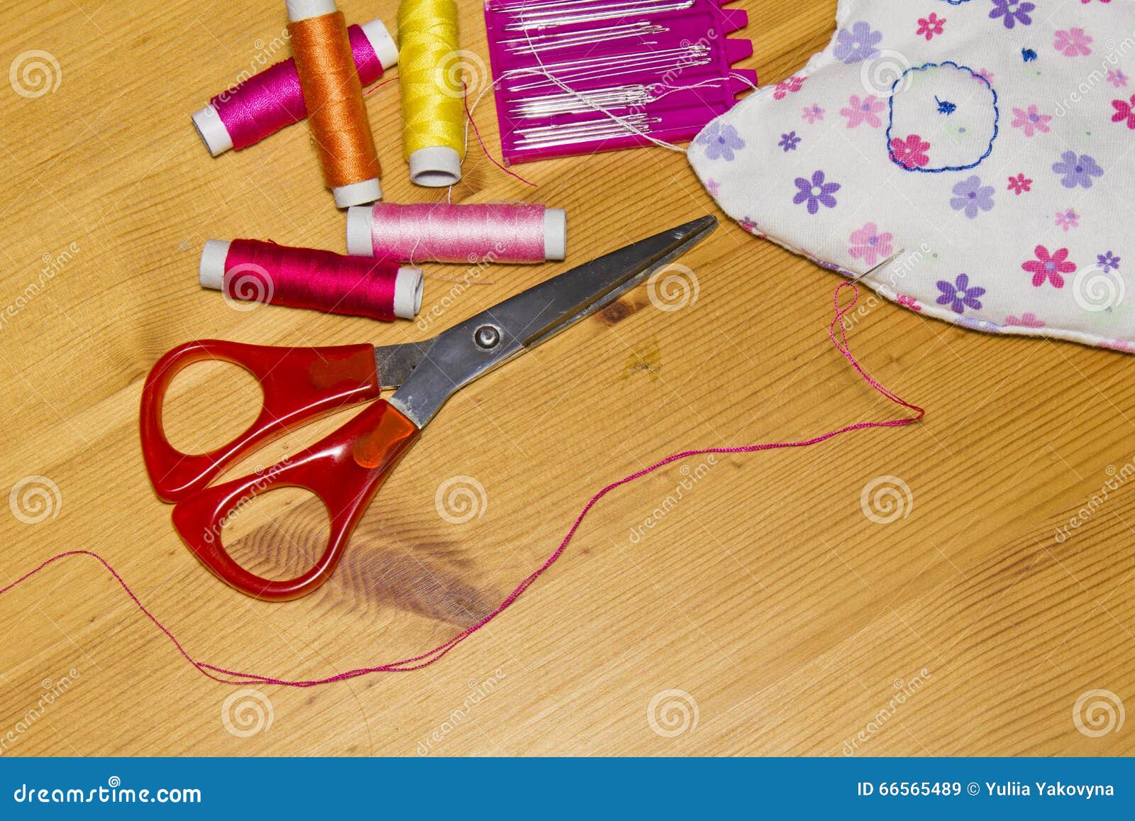 Thread, Needles, Scissors and a Toy on the Table. Stock Image - Image ...
