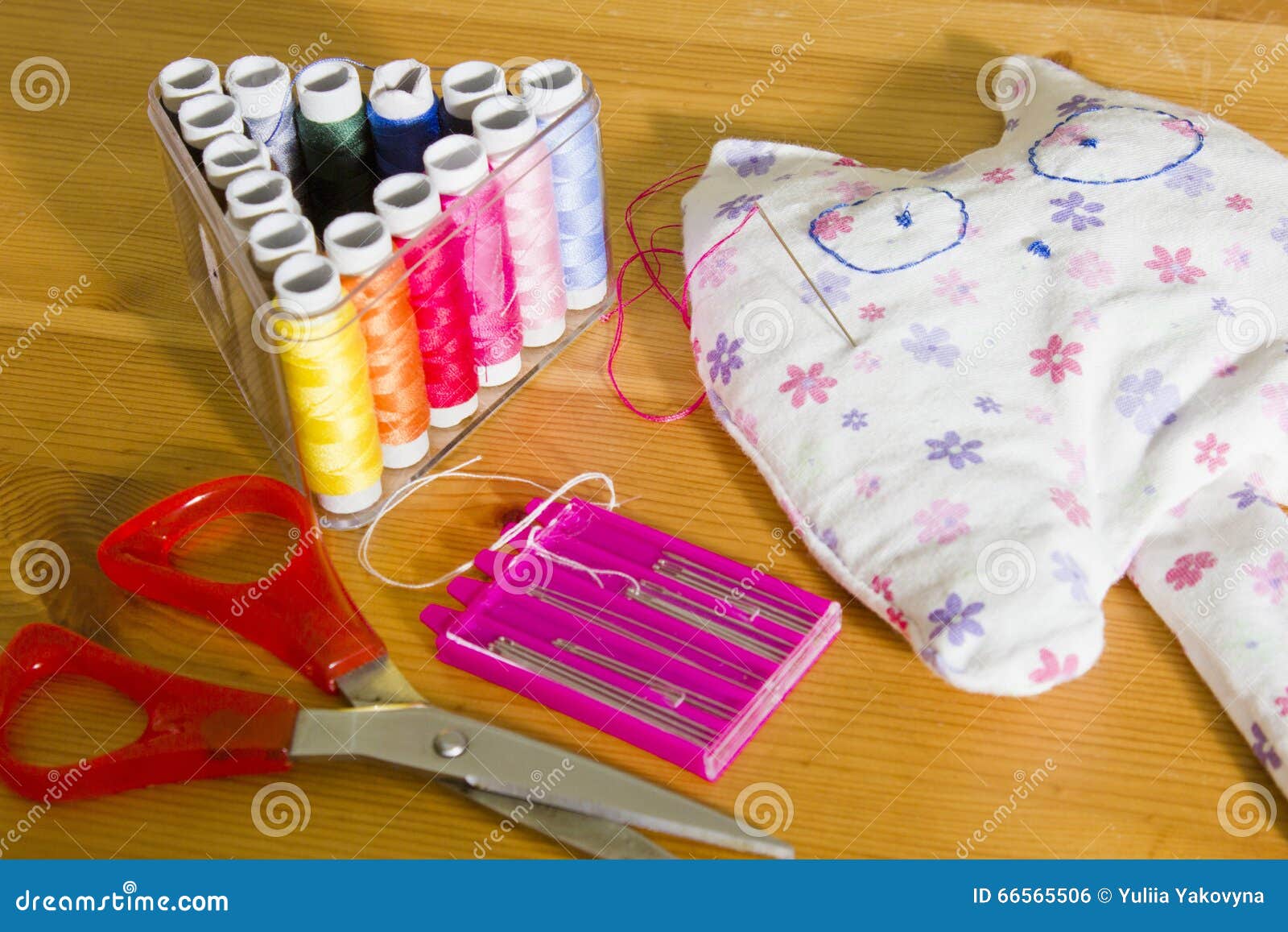 Thread, Needles, Scissors and a Toy on the Table. Stock Photo - Image ...