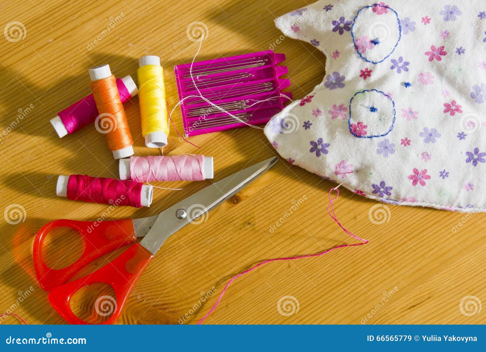 Thread, Needles, Scissors and a Toy on the Table. Stock Image - Image ...