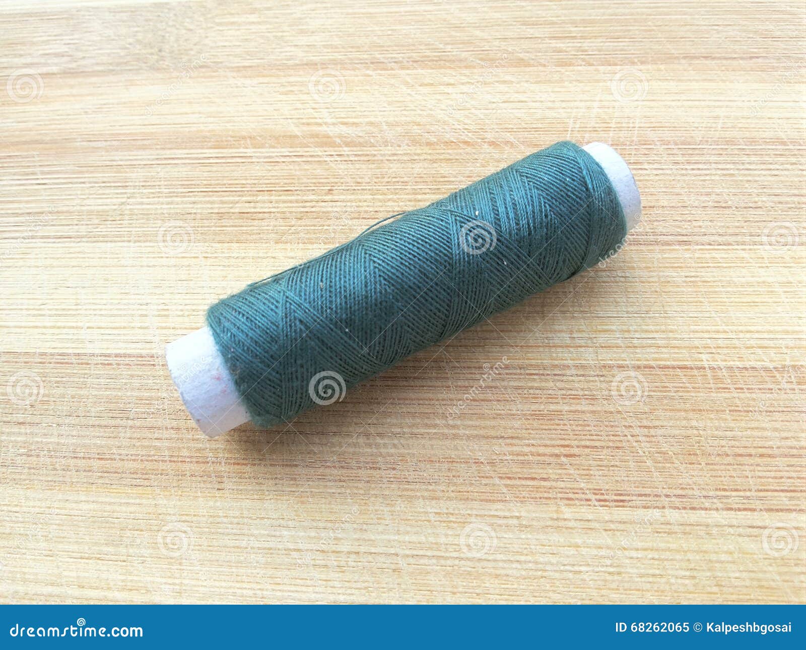 Thread Roll on Wooden Background Stock Image - Image of isolated ...