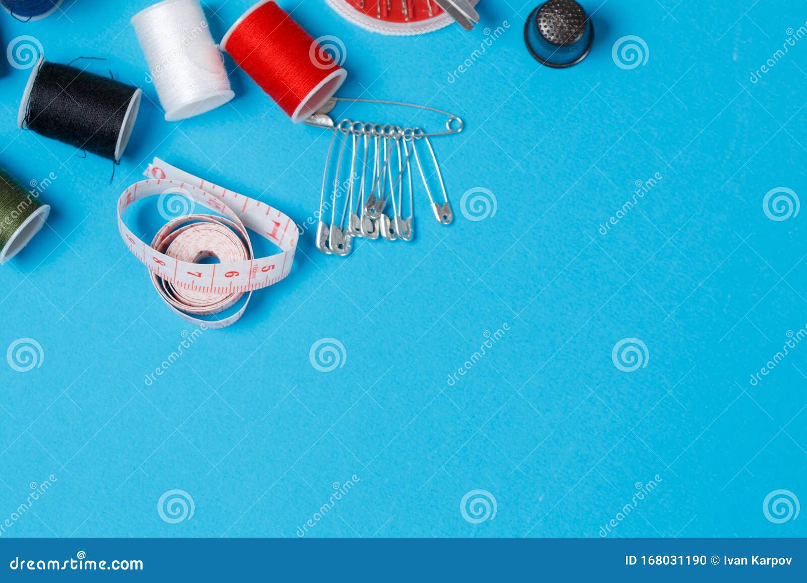 Thread Spools Tailor Equipment on Blue Background Stock Photo - Image ...