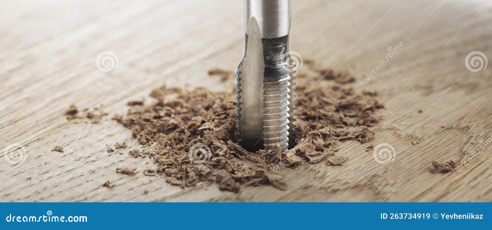 Thread Tap Drill Cutting Hole in Wooden Plate. Working Cutter Stock ...