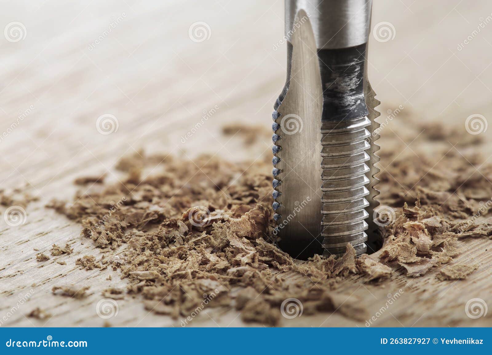 Thread Tap Drill Cutting Hole in Wooden Plate. Working Cutter Stock ...