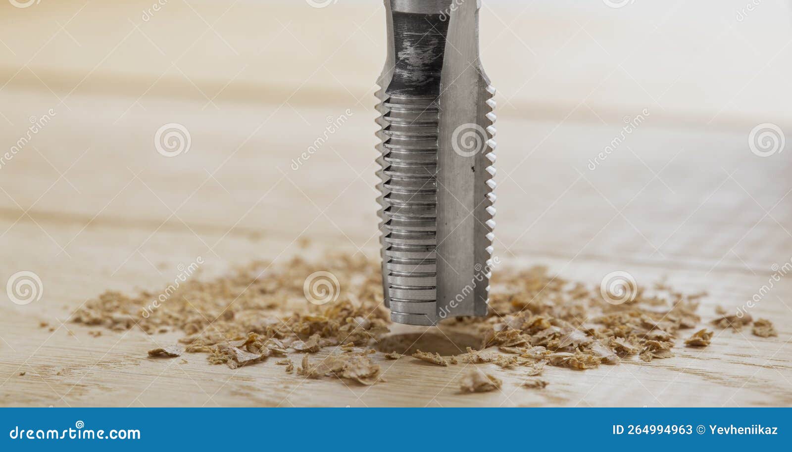 Thread Tap Drill Cutting Hole in Wooden Plate. Working Cutter Stock ...