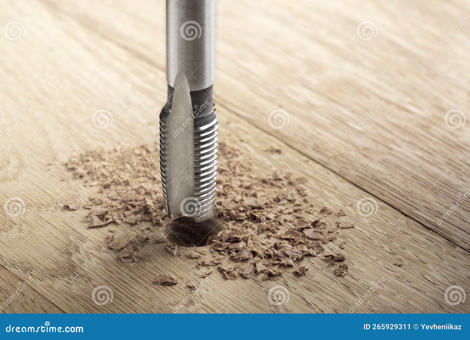 Thread Tap Drill Cutting Hole in Wooden Plate. Working Cutter Stock ...