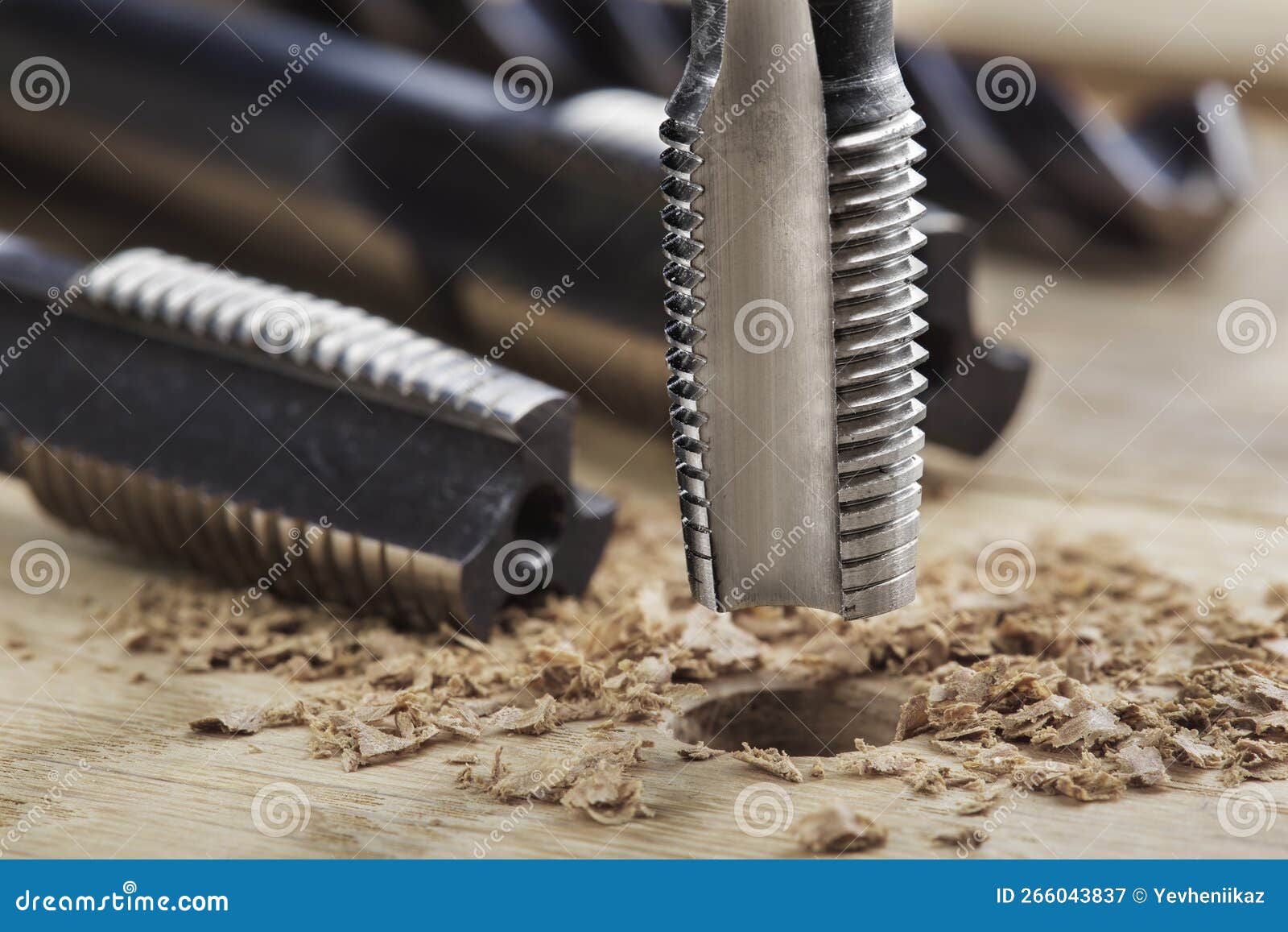 Thread Tap Drill Cutting Hole in Wooden Plate. Working Cutter Stock ...