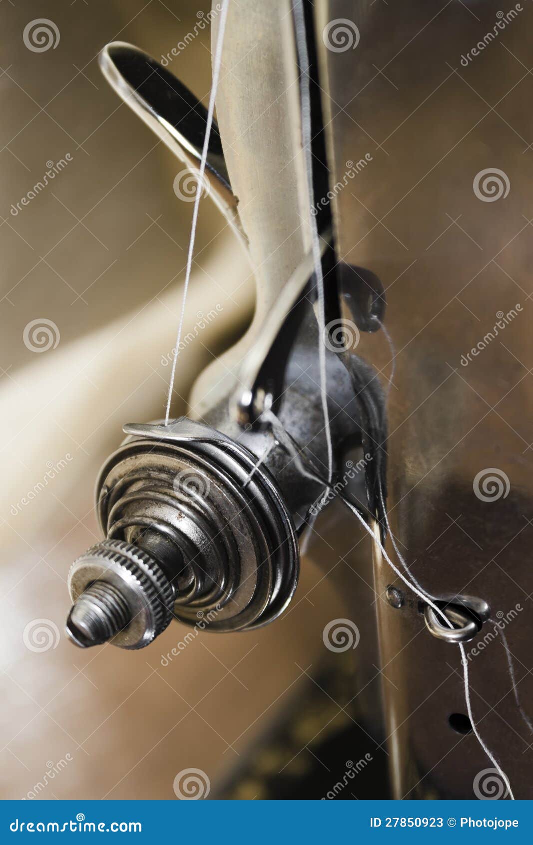 Thread tension regulator. stock image. Image of manufacturing - 27850923