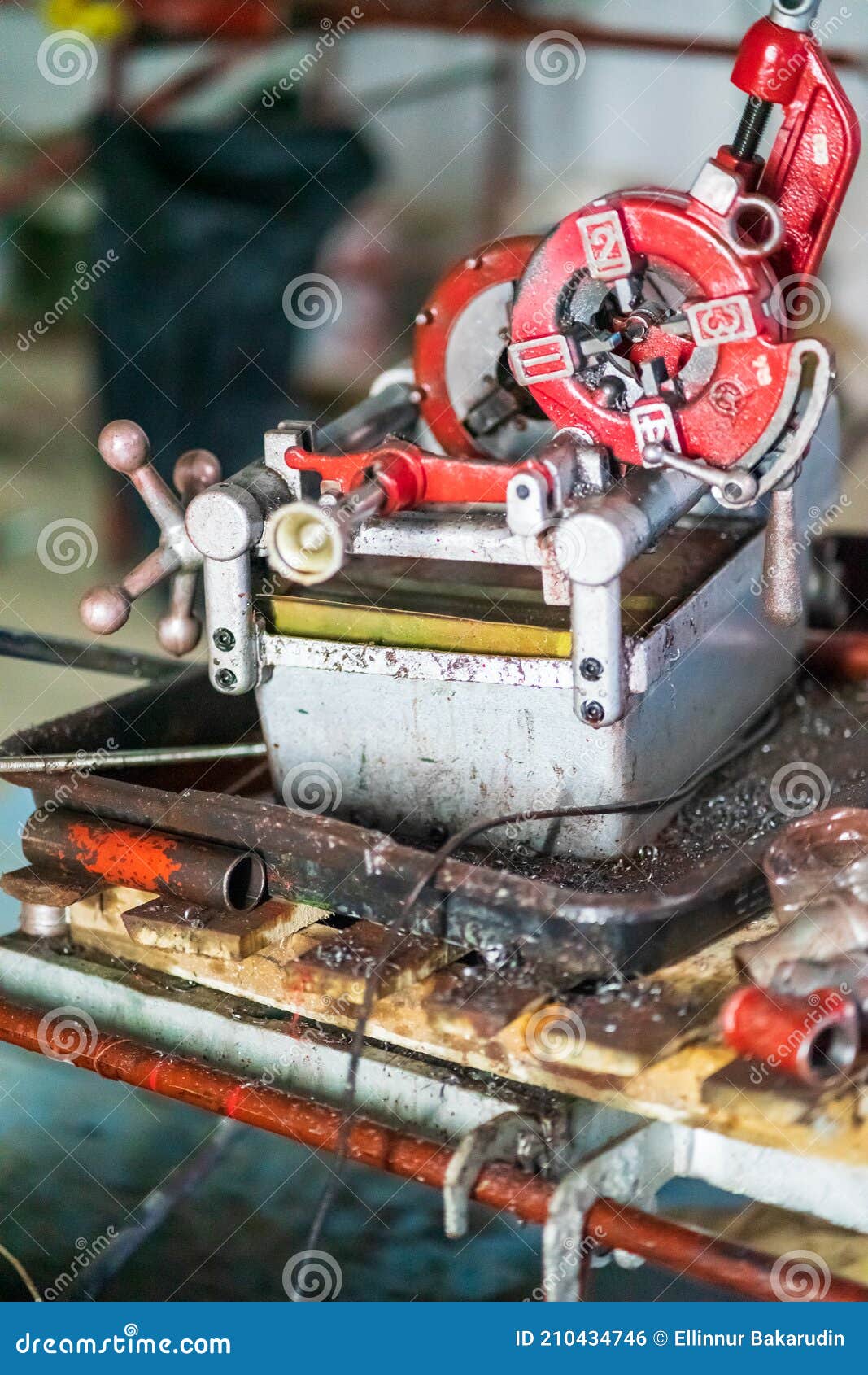 Threading Machine for Iron Pipes in a Construction Site Stock Photo ...