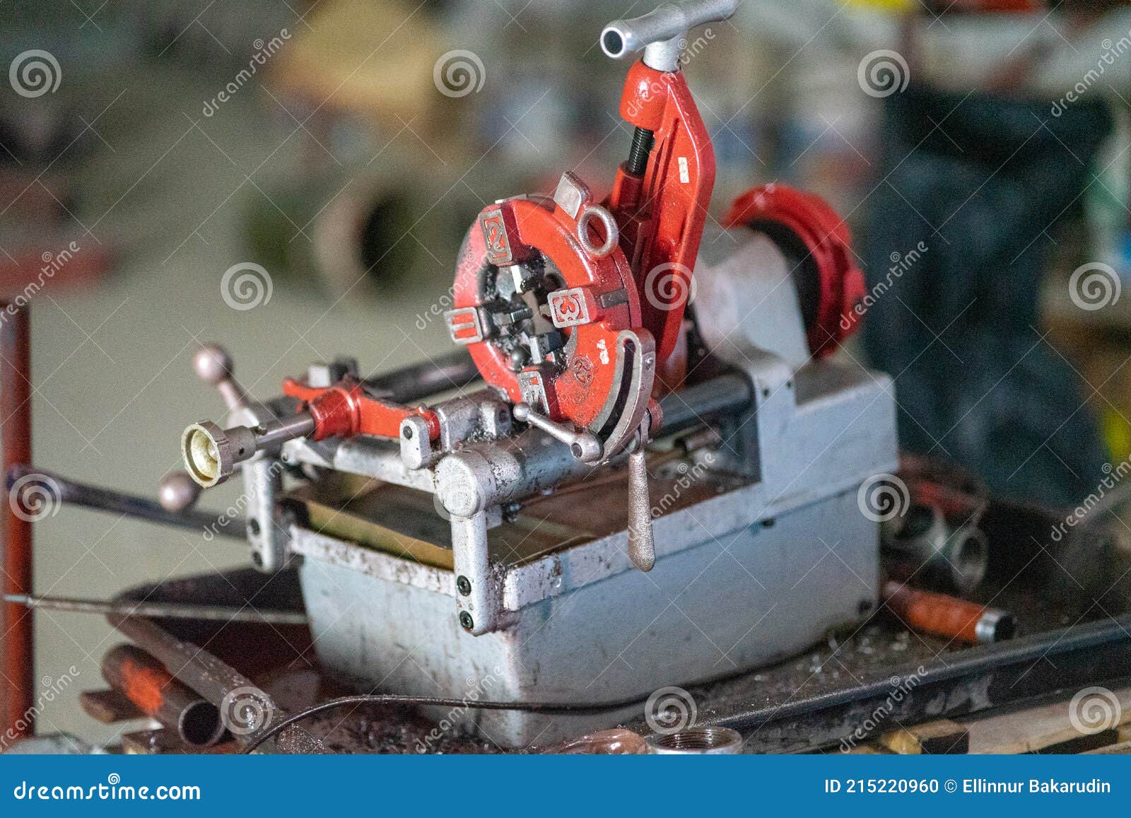 Threading Machine for Iron Pipes in a Construction Site Stock Photo ...