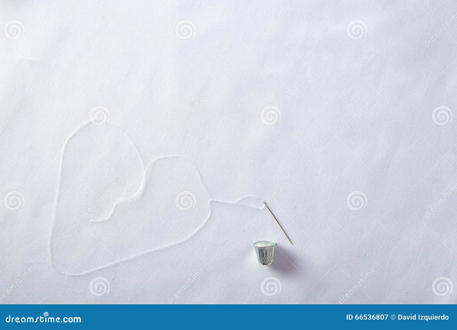 Threading Needle Thread Forming a Heart Background Top View Stock Image ...