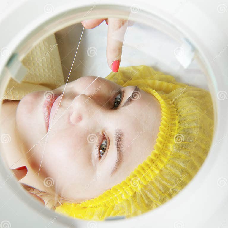 Threading procedure stock image. Image of beauty, persons - 29542195