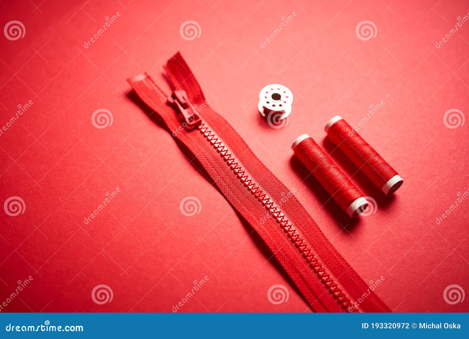 Threads and Zipper on a Red Minimalistic Background Stock Photo - Image ...