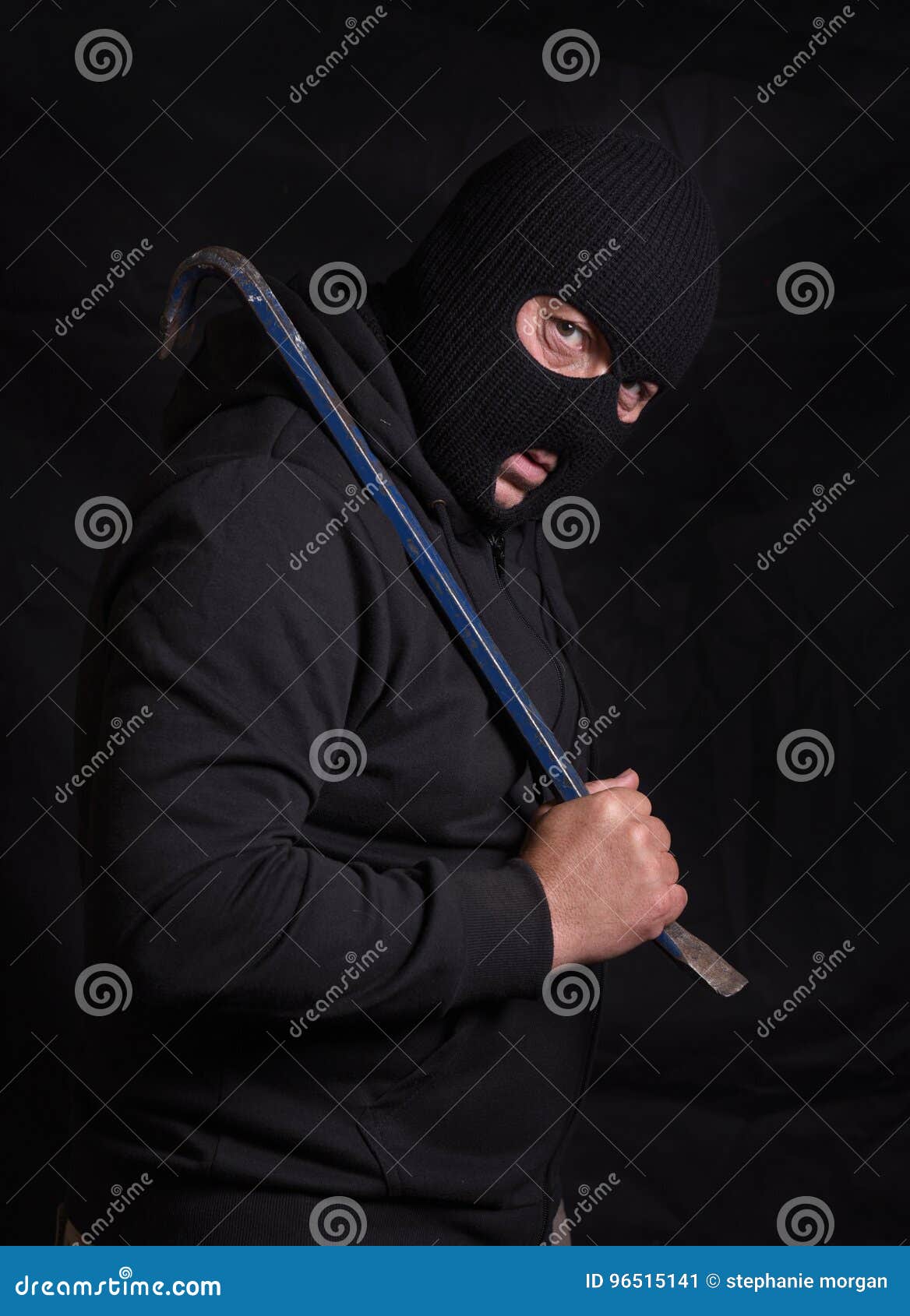 Threatening Man with a Balaclava Mask and Holding a Crowbar Stock Image ...