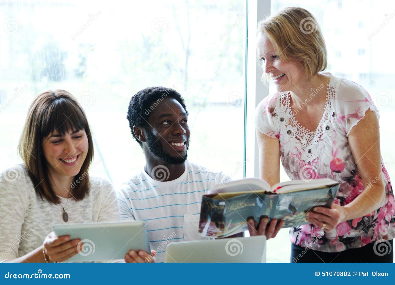 Three adults in discussion stock photo. Image of talking - 51079802