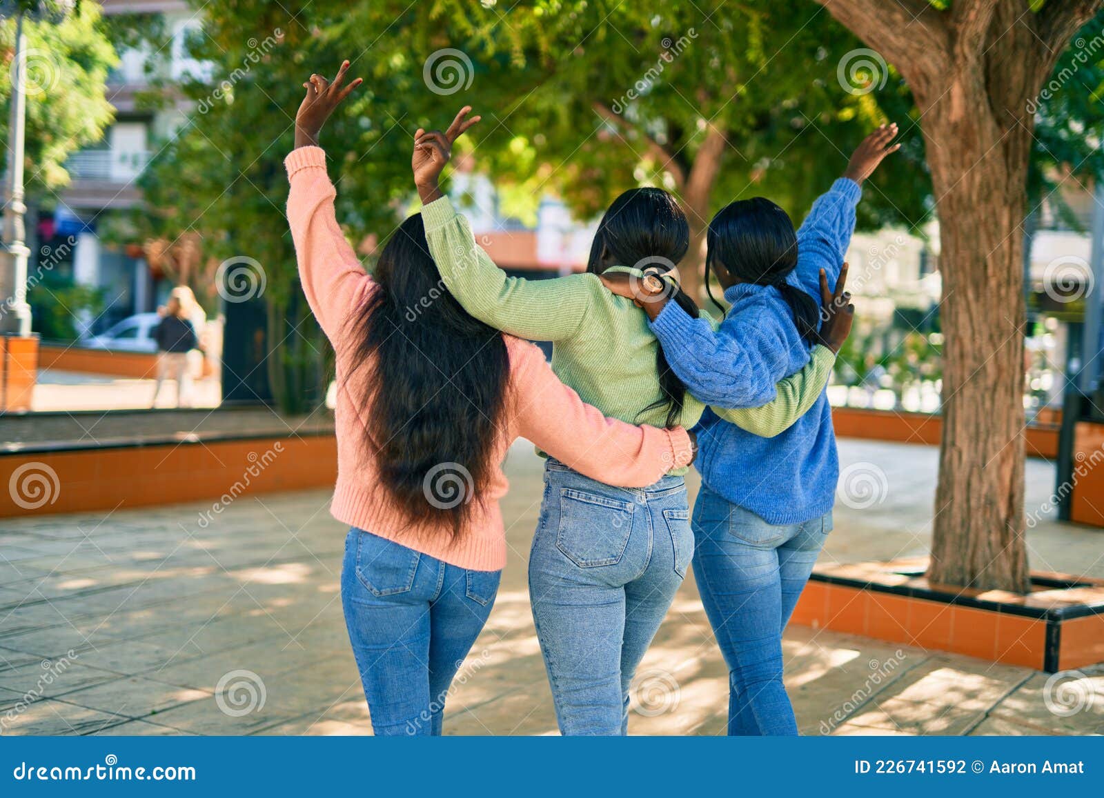 Three African American Friends on Back View Walking at the Park Stock ...