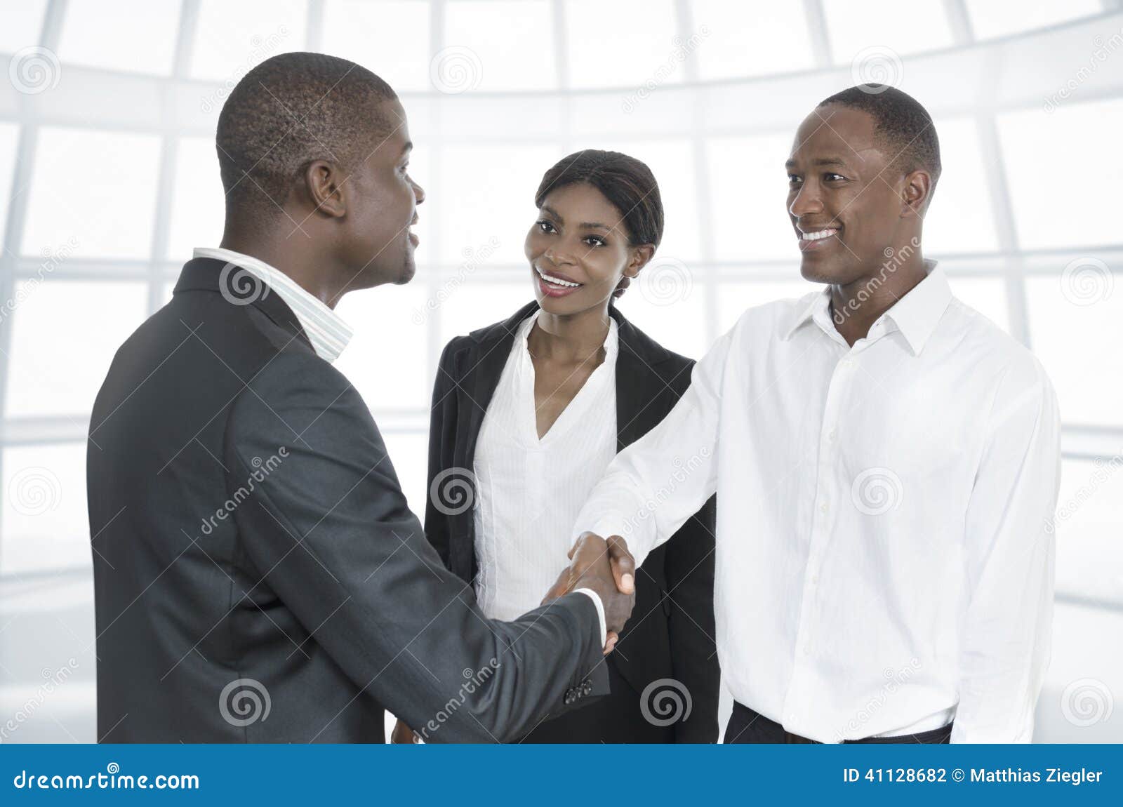 Three African Business People Handshake Stock Photo - Image of business ...