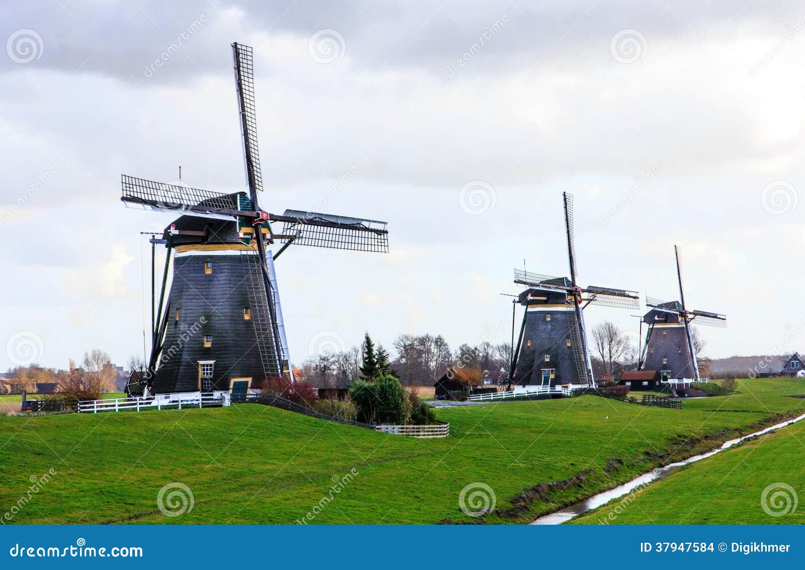 Three aligned windmills stock photo. Image of duck, field - 37947584