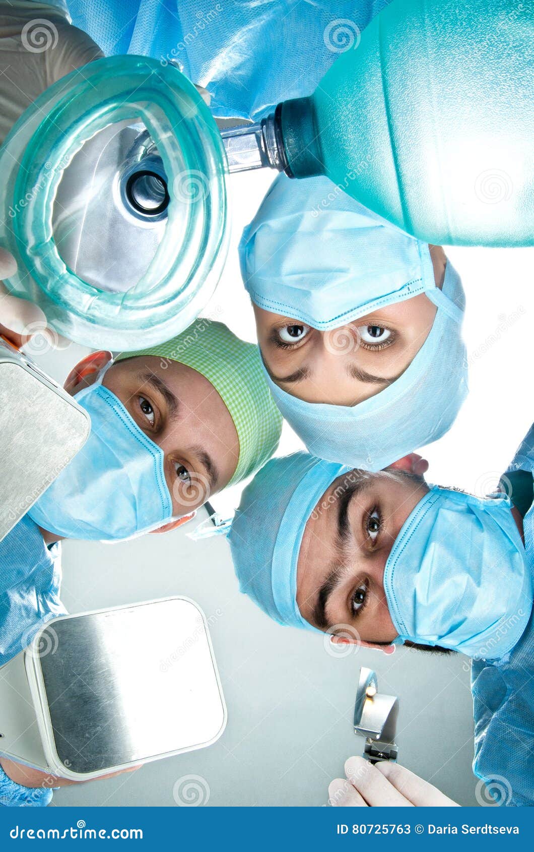 Three Anesthesiologist in the Operating Room with an Oxygen Mask ...