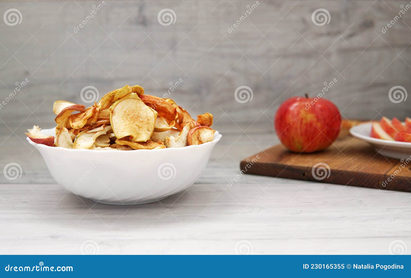 Three Apples and Plates with Dry Apples on Table Stock Image - Image of ...