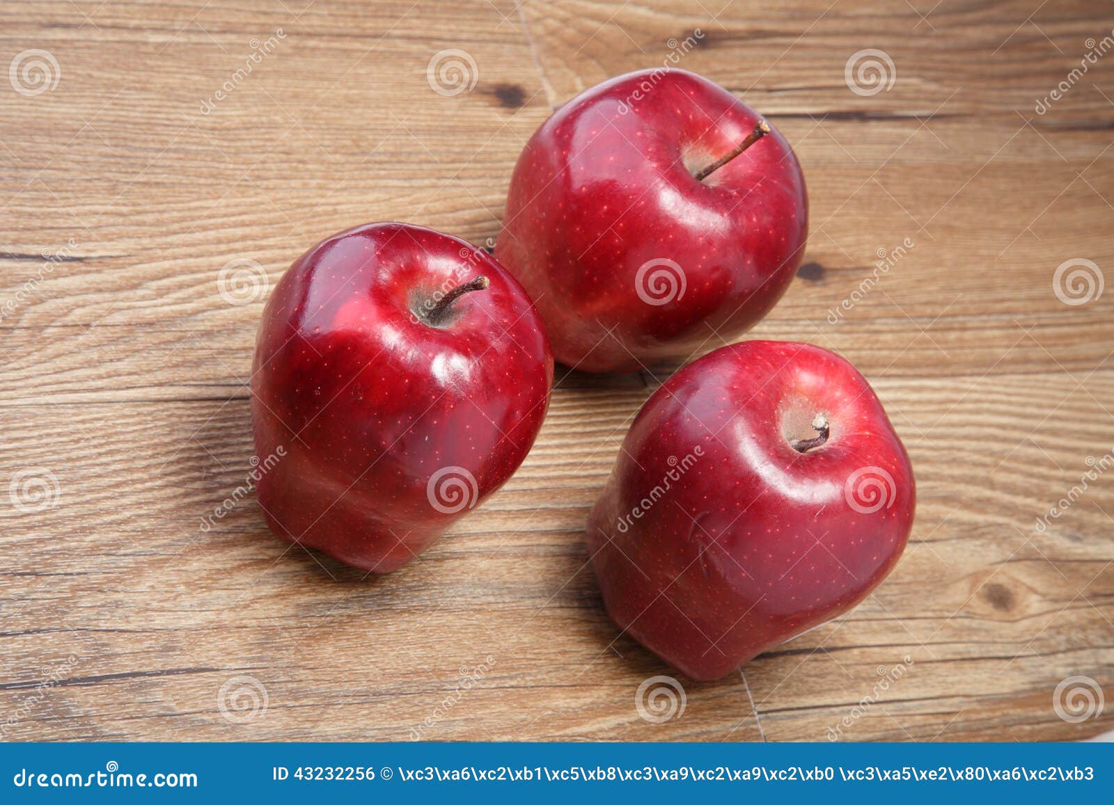 Three apples on the table stock photo. Image of closeup - 43232256