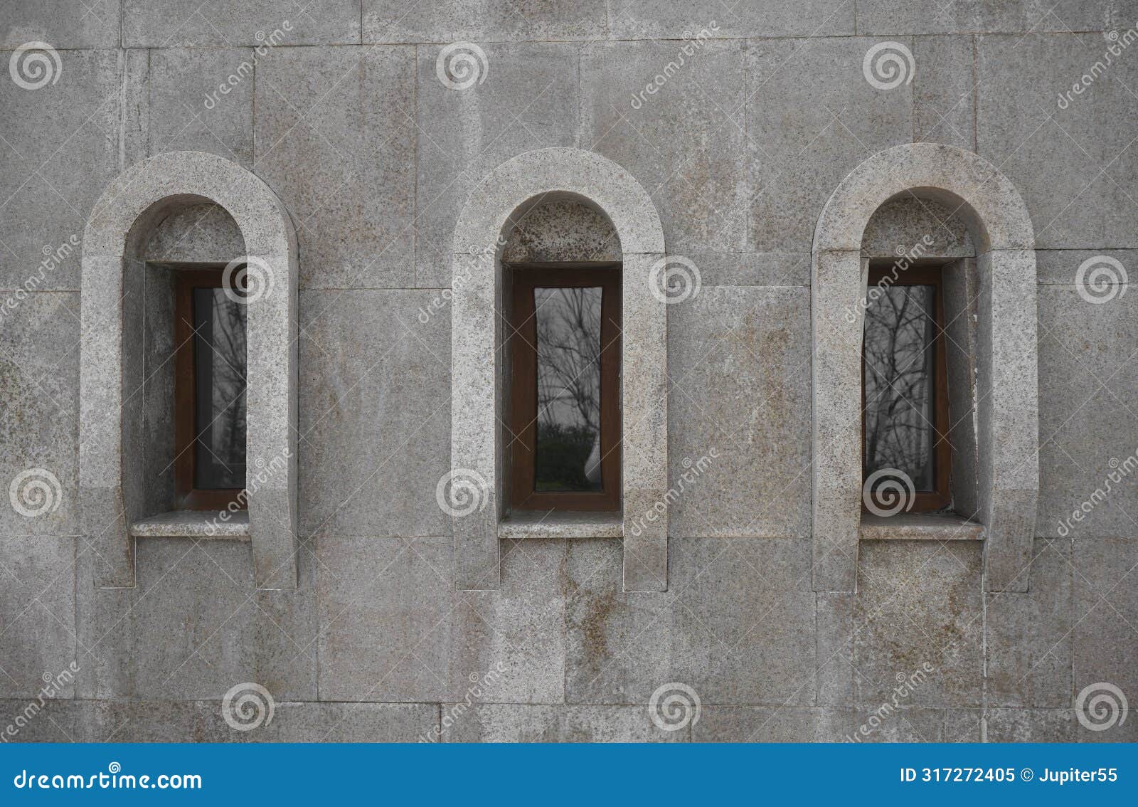 3 Three Arched Classic Windows in Granite Exterior Wall. Small Wooden ...