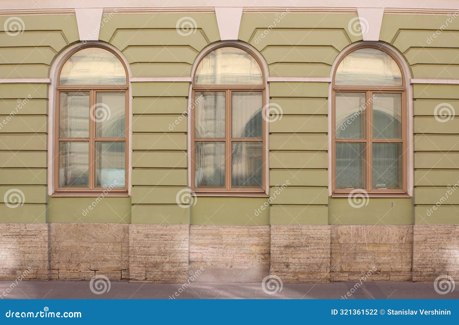 Three Arched Windows on the Ground Floor of the House Stock Photo ...