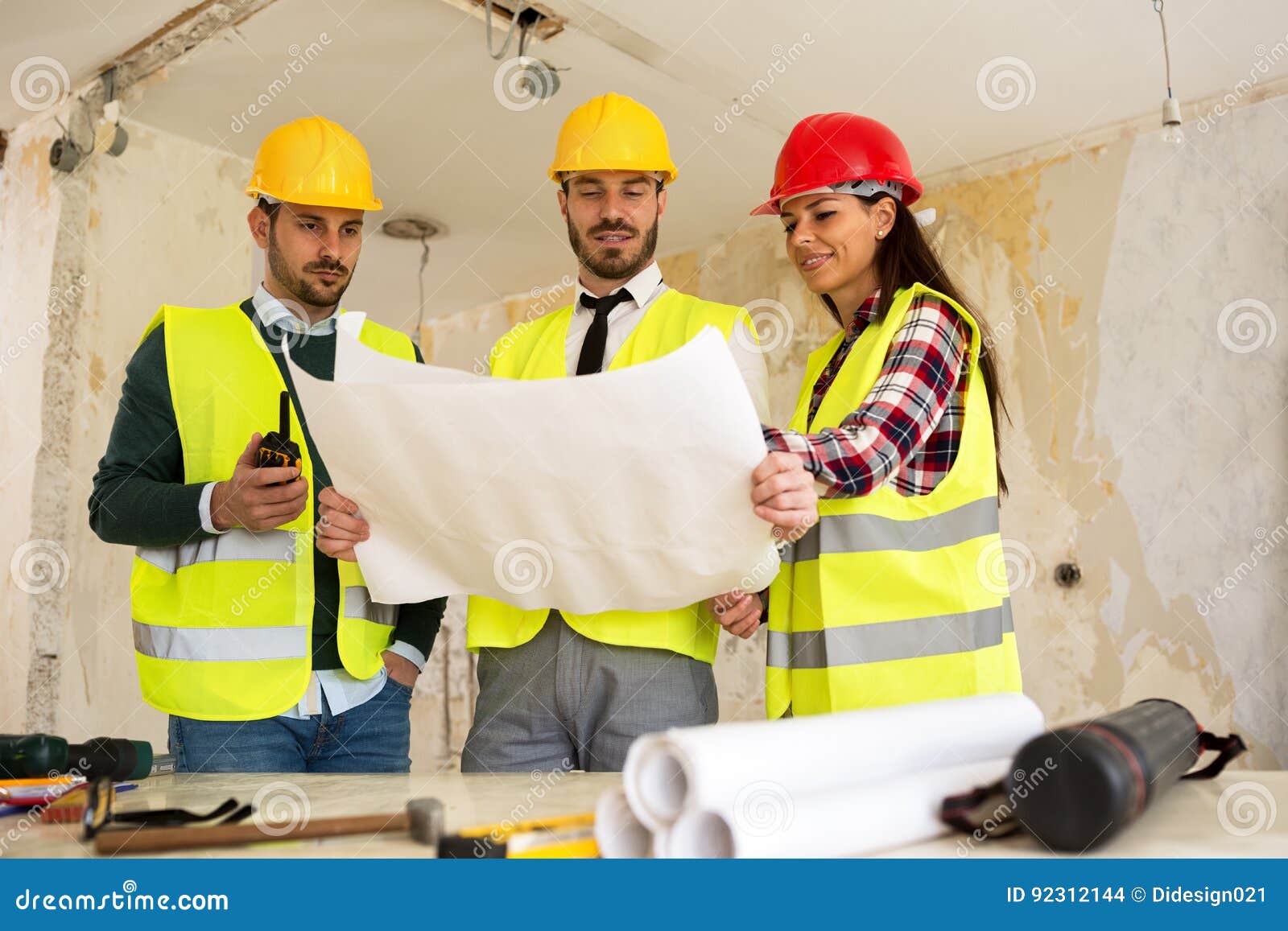Three Arhitects Working Together on Construction Site Project Stock ...