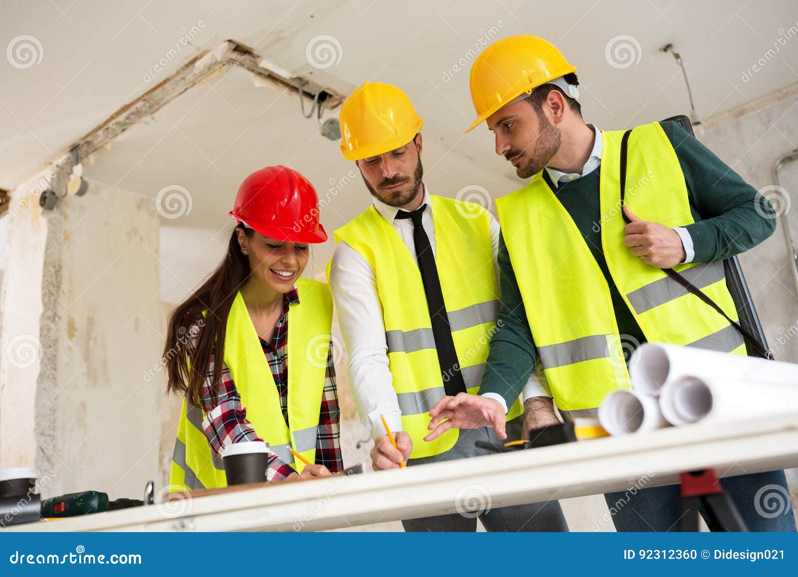 Three Arhitects Working Together on Construction Site Project Stock ...